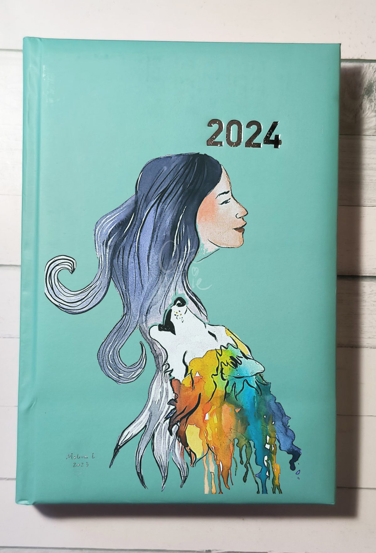 Agenda personalizada a mano 2024